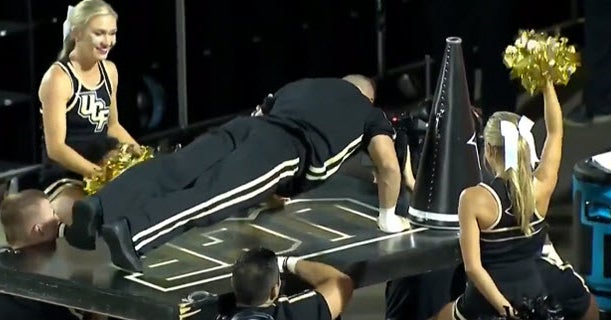 WATCH: UCF cheerleader struggles to crank out 63 pushups
