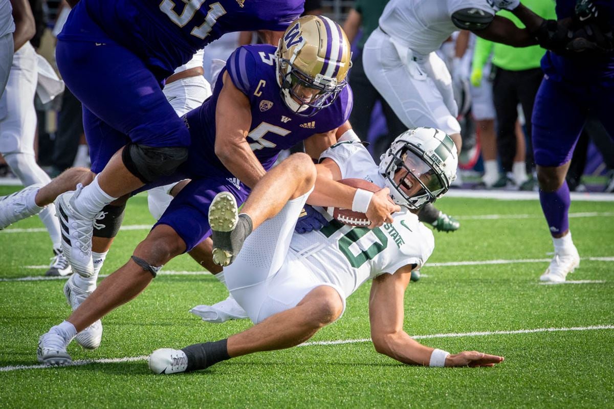 How did Pro Football Focus grade the Michigan State-Washington game?