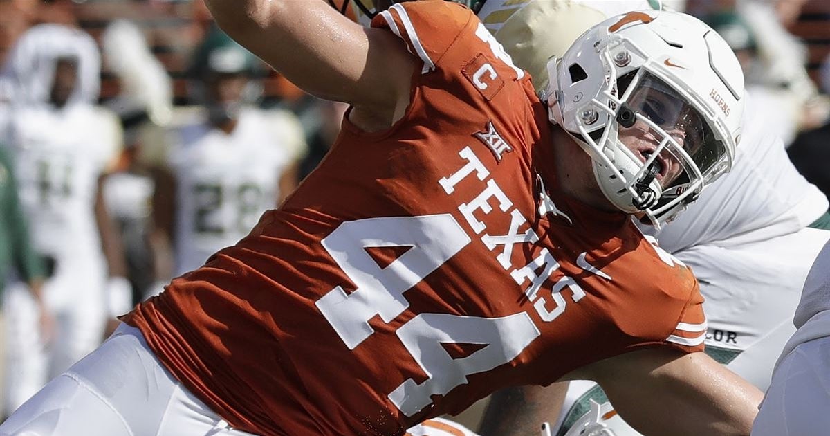 Texas DE Breckyn Hager injures elbow in loss to West Virginia