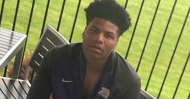 JuCo defensive end Julius Coates reacts to Colorado's offer