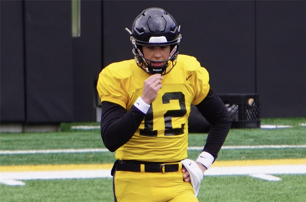 Former Michigan teammates have high praise for new Iowa quarterback ...
