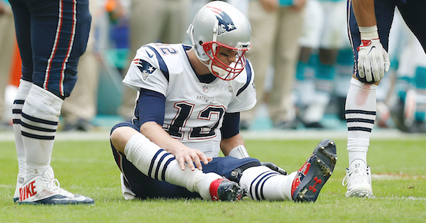 Is Tom Brady battling a serious knee injury?