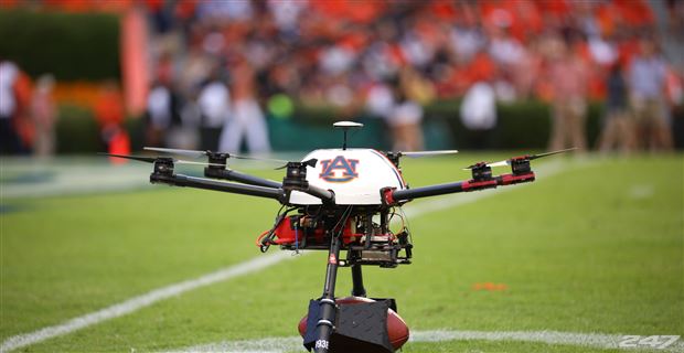 Look, watch as drone drops game ball from high above Auburn