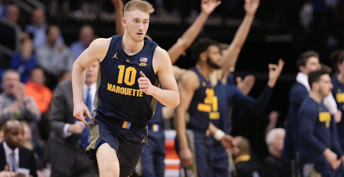 Report: Marquette's Hauser brothers to visit MSU