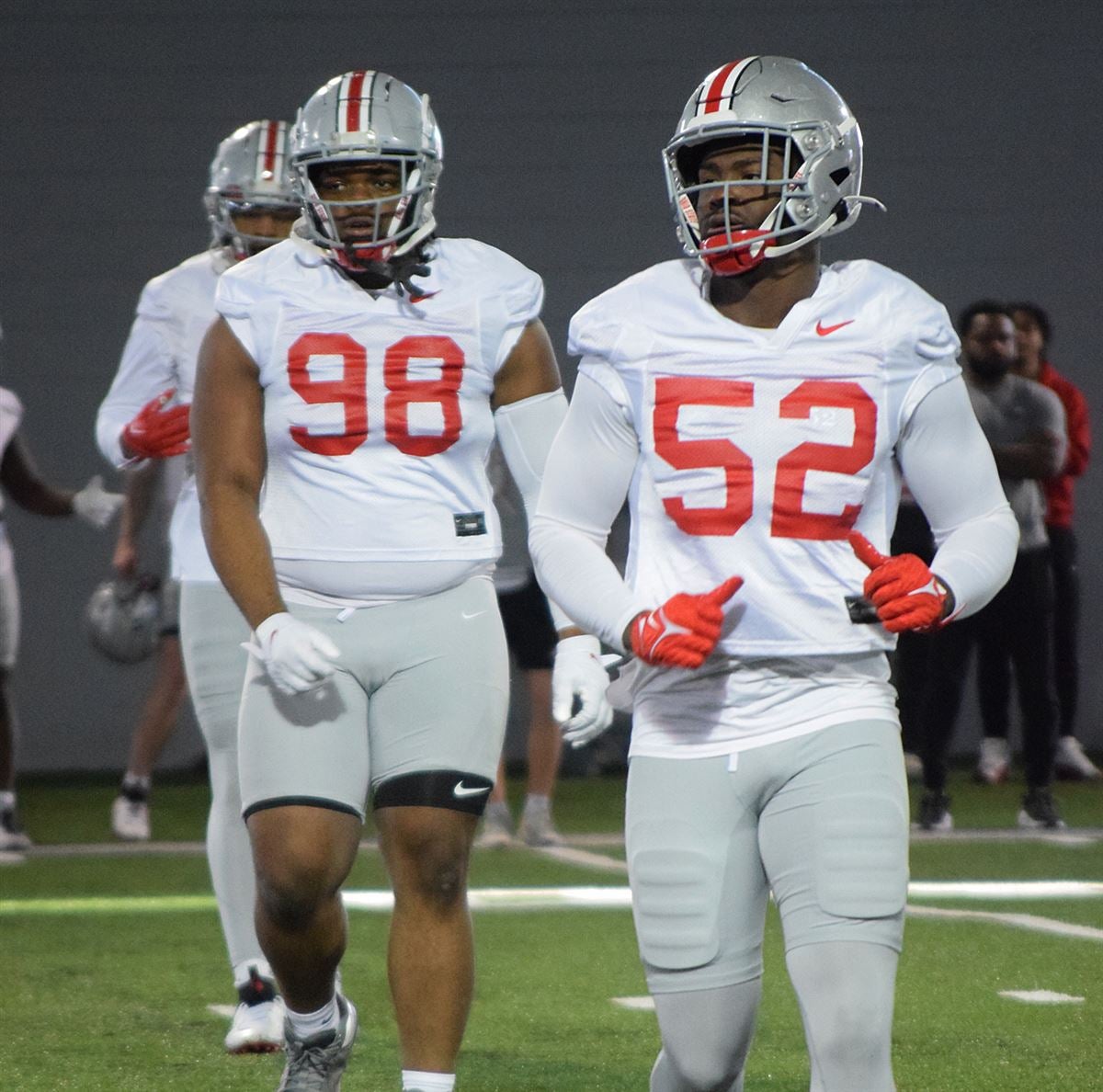 Sights and Sounds: Freshmen, transfers take field for first time at ...