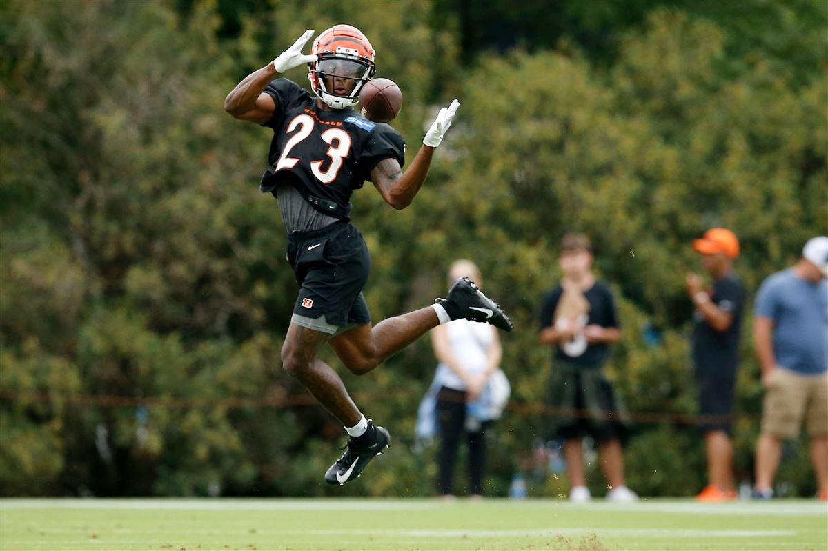 Ex-Michigan star Dax Hill embraces Cincinnati Bengals training camp ...