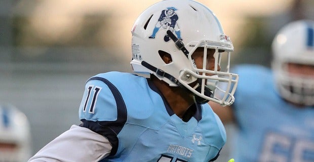 Max Patterson chopping wood as new pastime