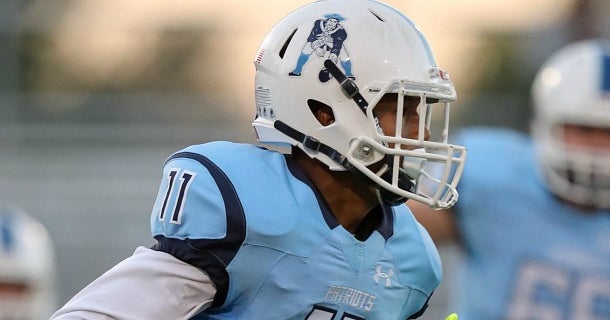 Max Patterson chopping wood as new pastime