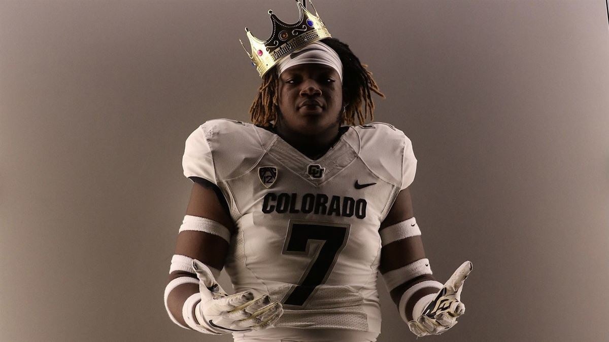 Texas defensive lineman Aaron Austin goes Buff