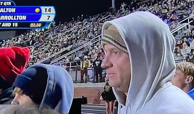 Ole Miss head coach Lane Kiffin watches Caleb Odom in state playoff game