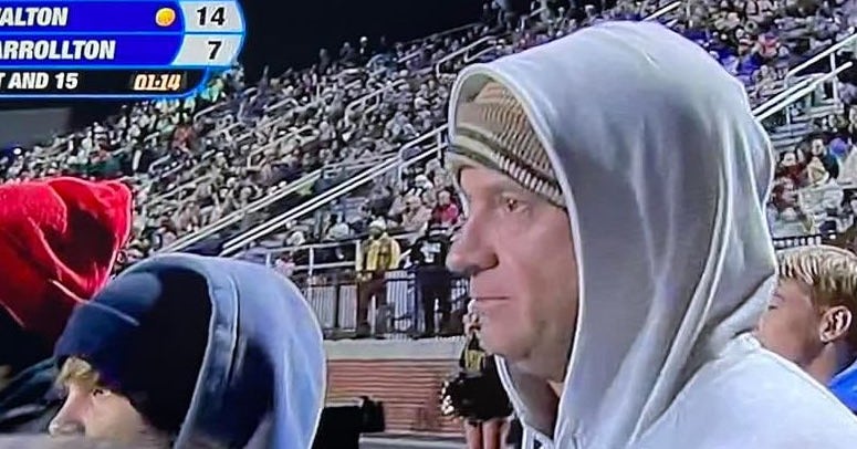 Ole Miss head coach Lane Kiffin watches Caleb Odom in state playoff game