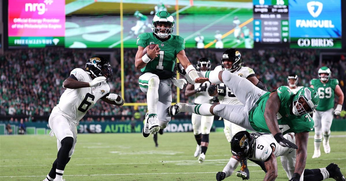 WATCH: A fan catches Jalen Hurts' overthrown pass and immediately ...