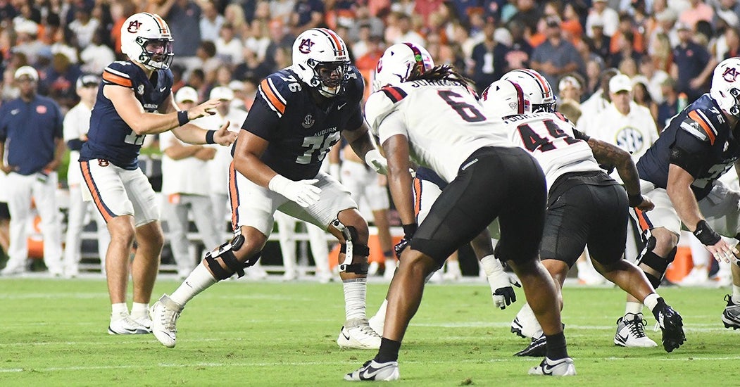 Auburn looks for more 'strain' from offensive line, pass protection