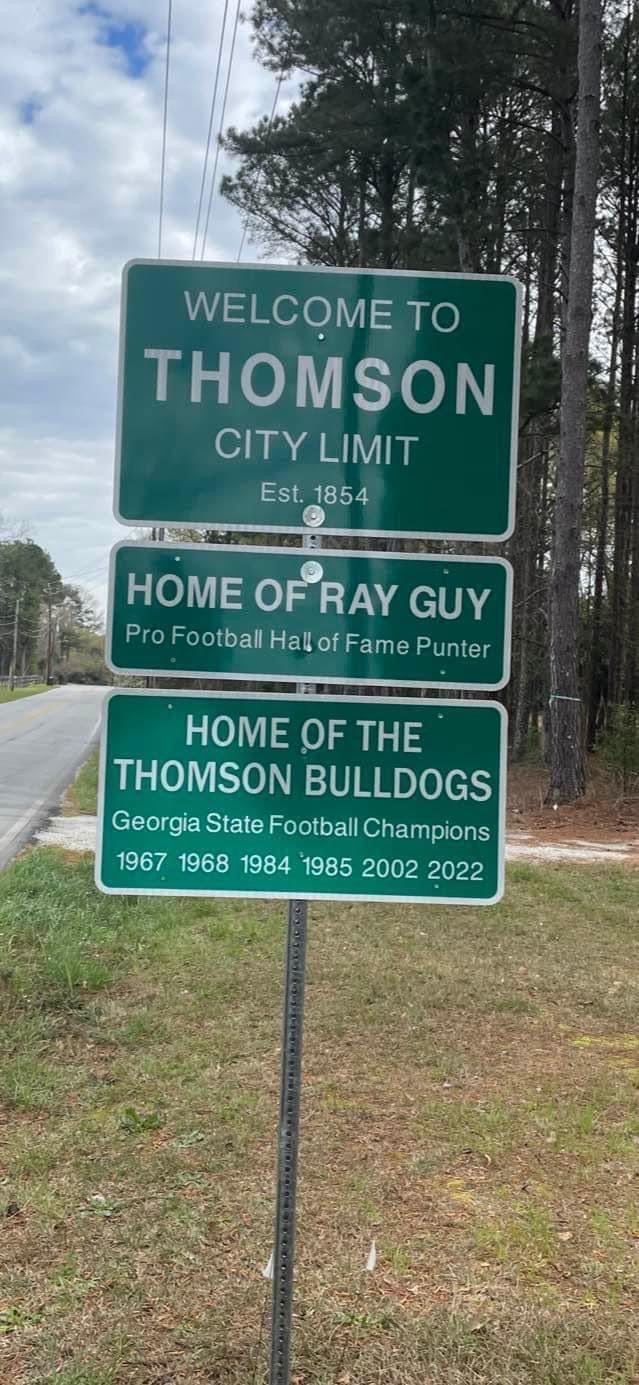 Thomson new sign