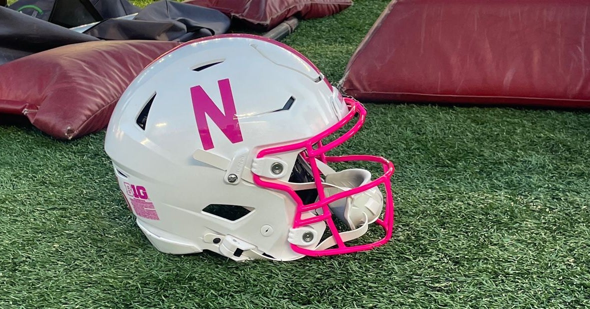 Husker helmets with a pink 'N,' stripe and facemask for breast cancer ...