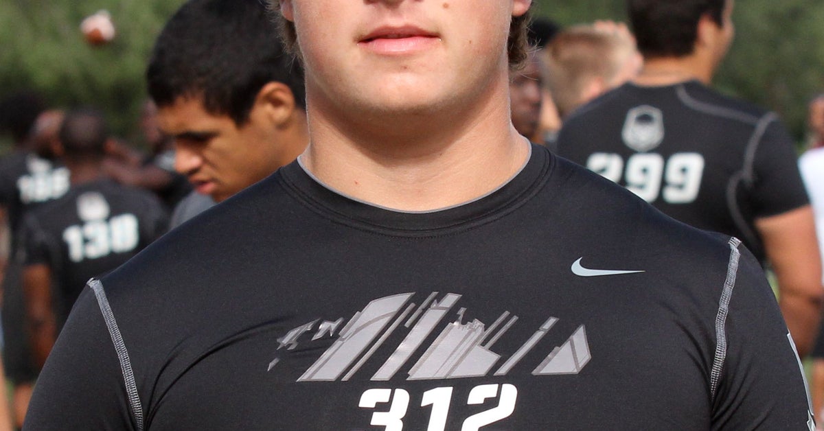 Mason Cole Commits to Michigan