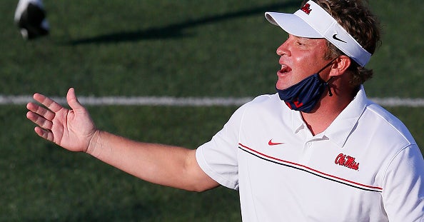 Lane Kiffin reacts to his epic clipboard toss after Ole Miss TD