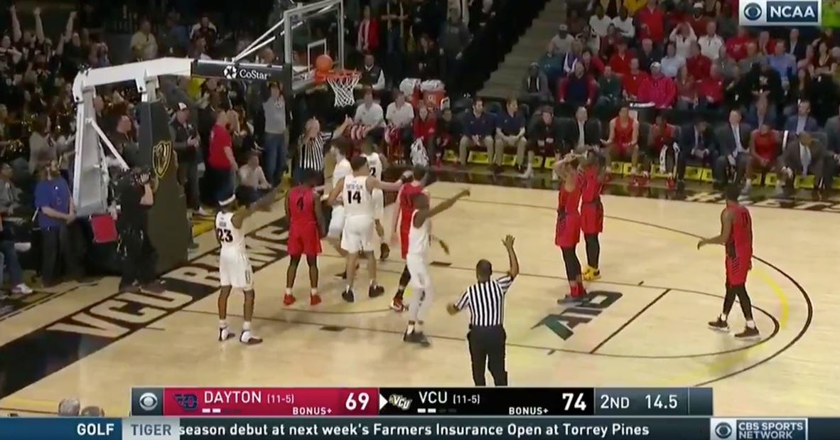 Watch: Dayton shot stuck on back of rim, miss leads to bad beat