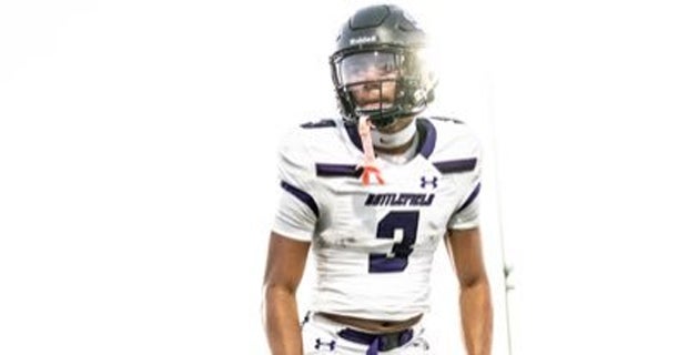 DB Cole Woodson heading out on spring visits with purpose