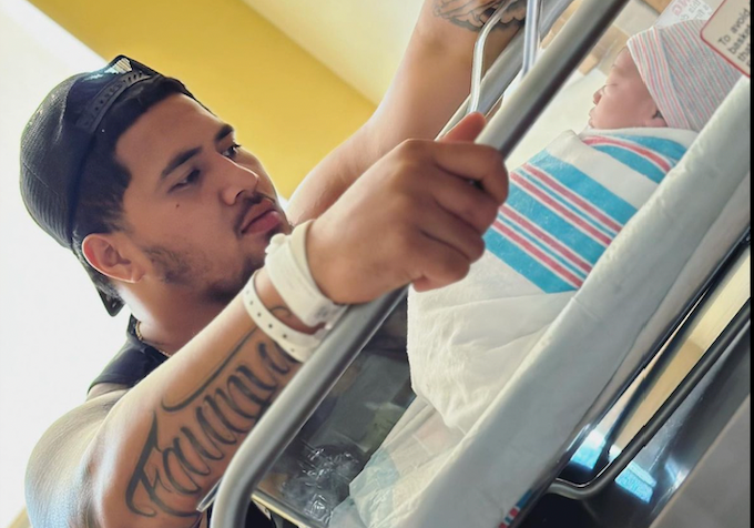 New dad Virginia DT Aaron Faumui honors best friend's memory through son