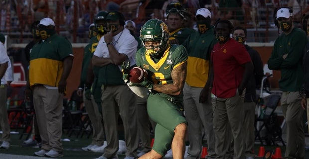 New receivers coach Dallas Baker reflects on the progress of his unit