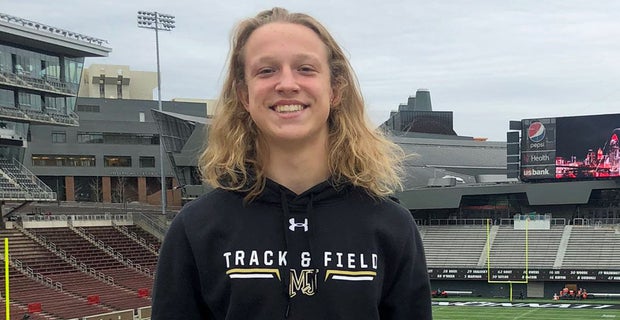 Chris Partridge pulls the trigger on linebacker Ethan Crisp, who reacts ...