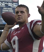 Injured Josh Swogger takes his snaps at WSU practice